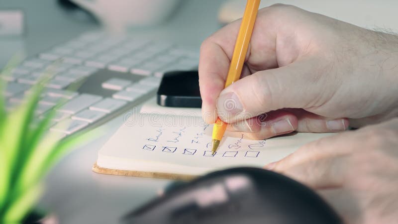 Marking Tasks on the Checklist Notebook Office Table Stock Video ...