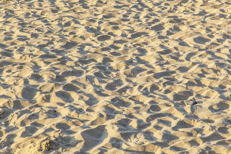Marks of feet at the beach stock image. Image of vacation - 37181473