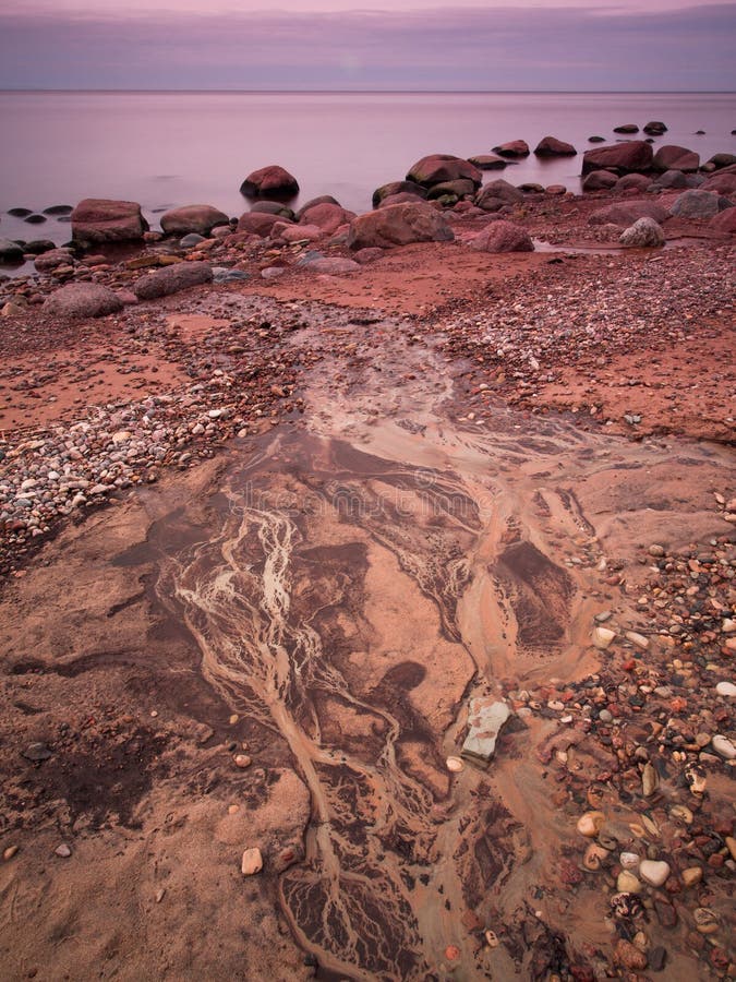 Marks Left by a Stream on the Rocky Beach. Stock Photo - Image of small ...