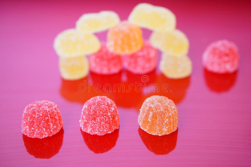 Marmalade on a Red Textured Surface. Close-up and Reflection Stock ...
