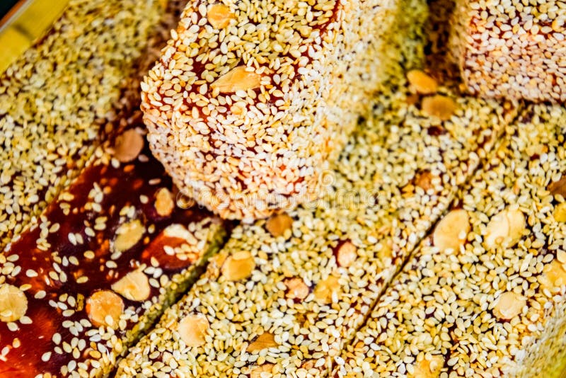 Marmalade Sticks with a Nut, Sprinkled with Sesame. Indian Sweets Stock ...