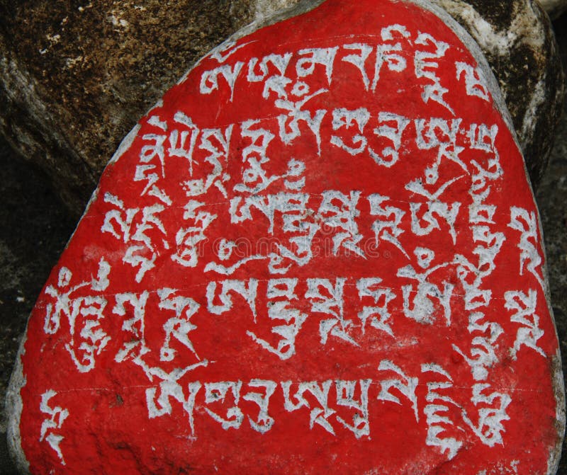 A marnyi stone in Tibet stock photo. Image of engraved - 48832392