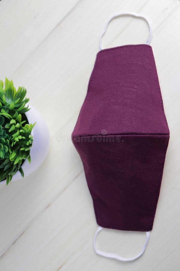 Maroon color mask stock photo. Image of lavender, pattern - 216353706