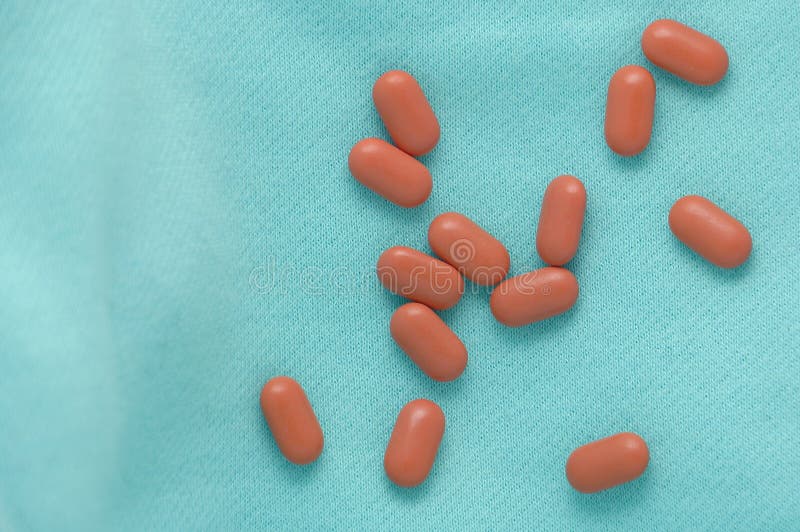 Maroon Pills and Pill Bottle Red Cap Stock Photo - Image of medicine ...
