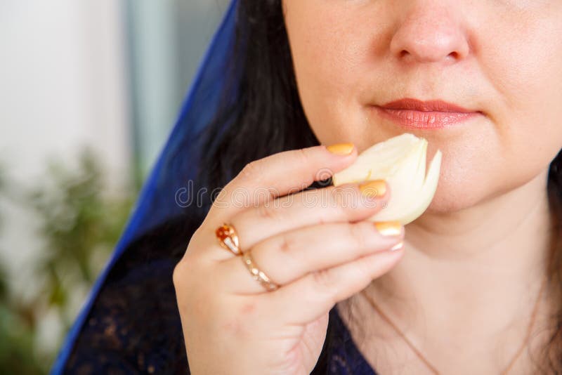 Maror in the Hands of the Woman Who she Eats. Stock Image - Image of ...