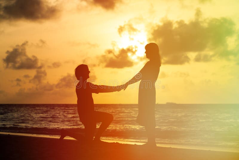 Marriage Proposal at Sunset Beach Stock Image - Image of couple ...