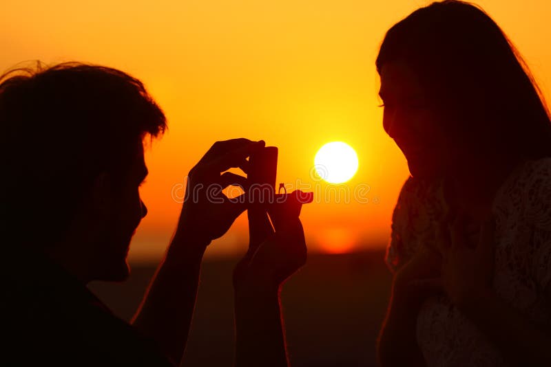 Marriage Proposal Sunset stock photo. Image of relationship - 64255356