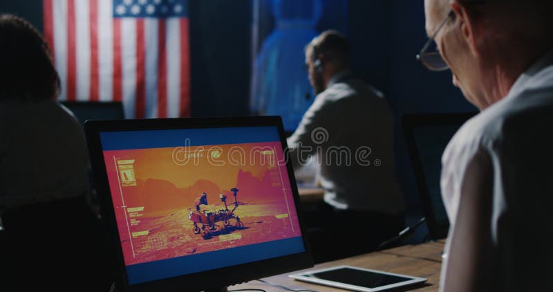 Mars Mission Technicians Working at Their Desk Stock Photo - Image of ...