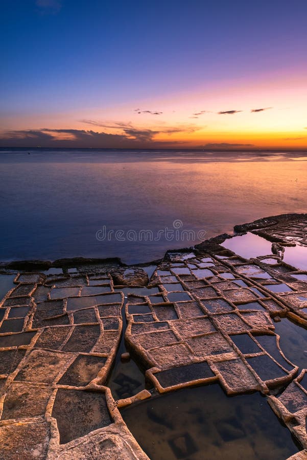 Marsaskala Salt Pans and Se at Sunrise Stock Image - Image of salt ...