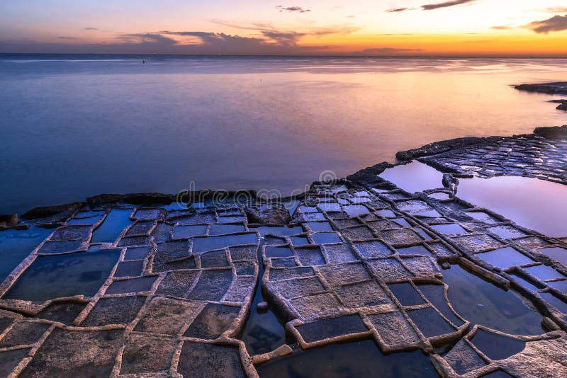 Marsaskala Salt Pans and Se at Sunrise, Malta Stock Image - Image of ...