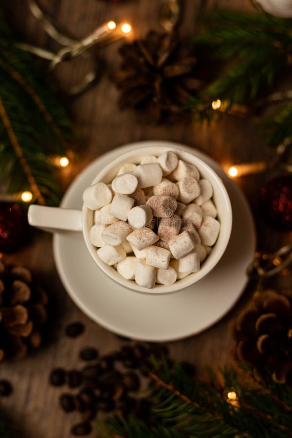 Marshmelon in a White Cup on a Table with Christmas Lights. Christmas ...