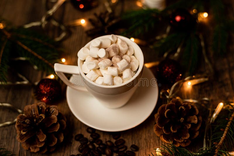 Marshmelon in a White Cup on a Table with Christmas Lights. Christmas ...