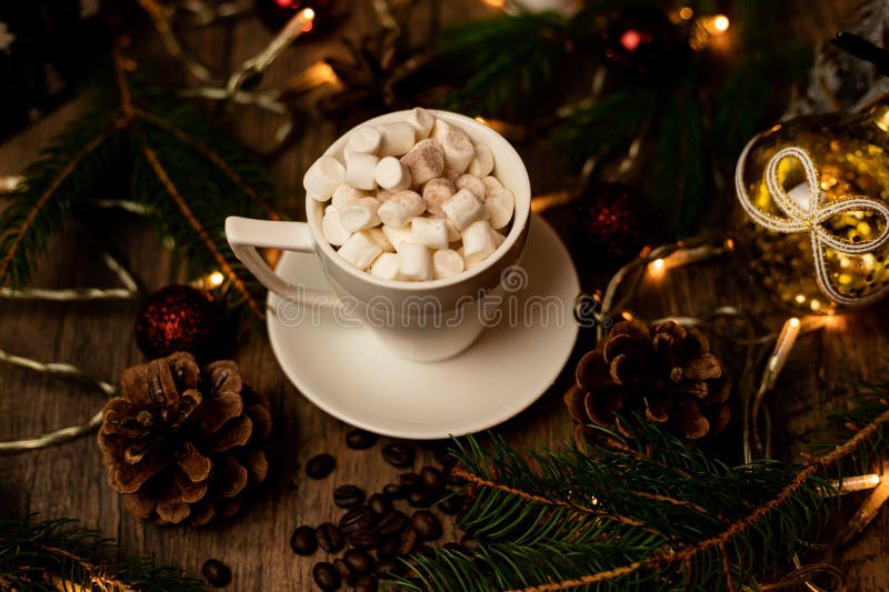 Marshmelon in a White Cup on a Table with Christmas Lights. Christmas ...