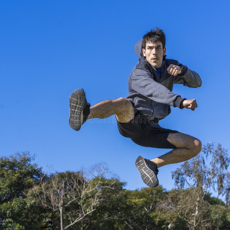 Martial Fighter Practicing Flying Kicks Stock Image - Image of action ...