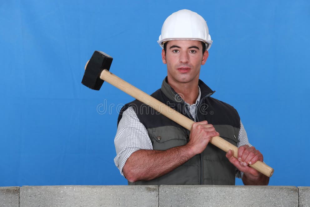 Martillo De Elevación Del Hombre Imagen de archivo - Imagen de libra ...