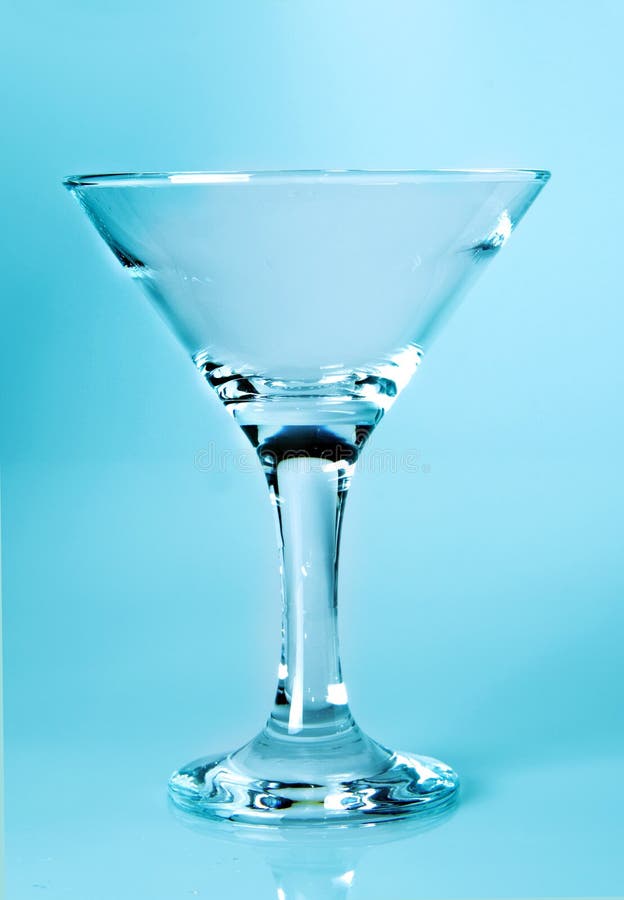 Martini Glass on Light Blue Stock Photo - Image of party, closeup: 27546084