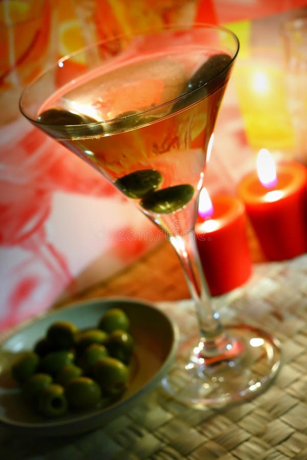 Olive and glass Martini stock photo. Image of pulp, cocktail - 18534926