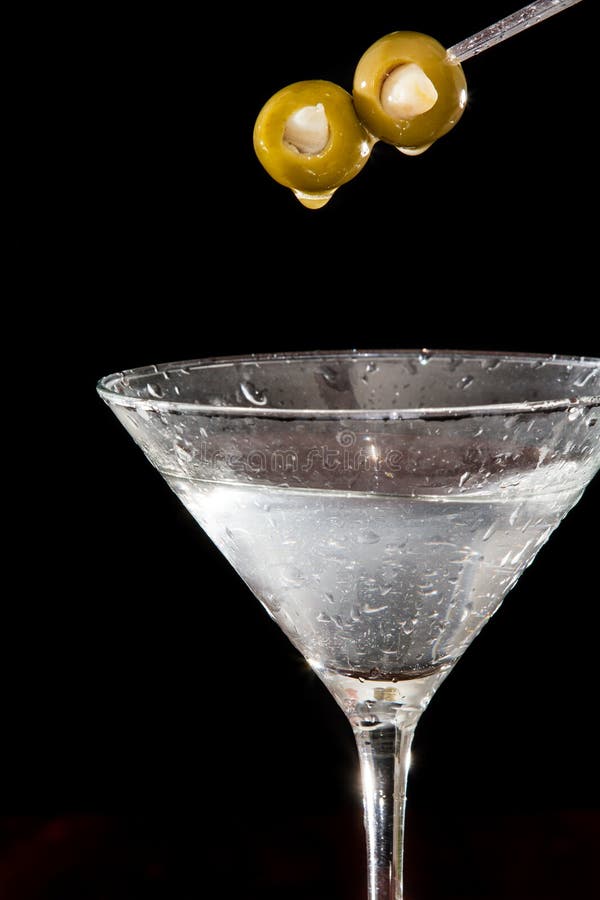 Martini with olives stock photo. Image of alcohol, beverage - 38075454