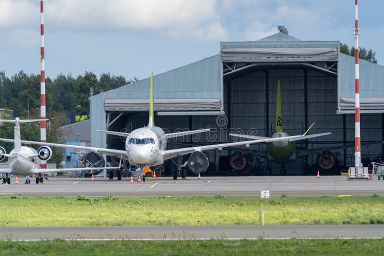 Marupe, Latvia - August 4, 2023 - an Airplane Hangar with an Open Gate ...