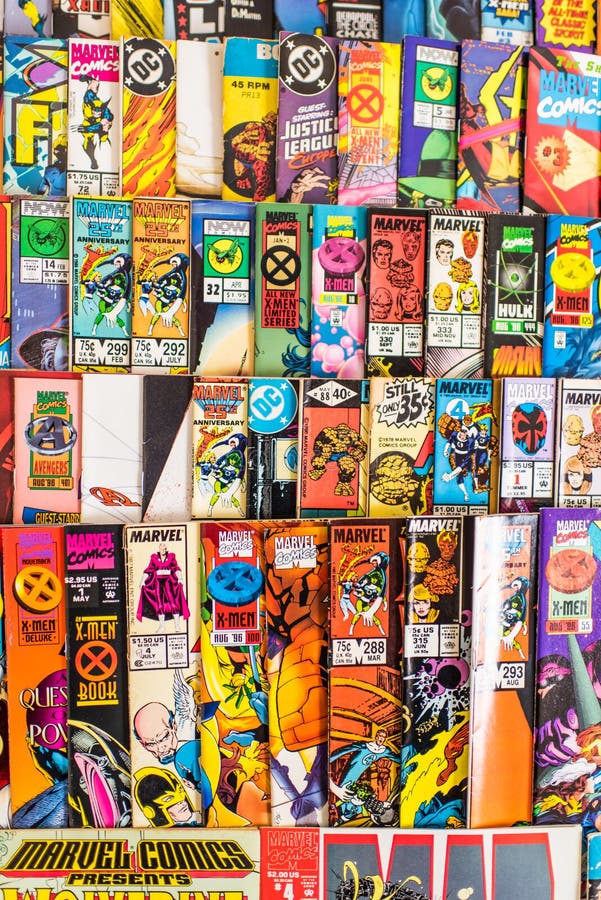 Marvel and DC Comic Book on Display Editorial Photography - Image of ...