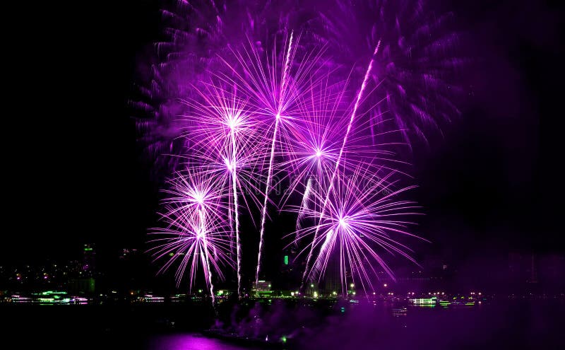 Fantastic Purple Fireworks Exploding into the City Night Sky Stock ...