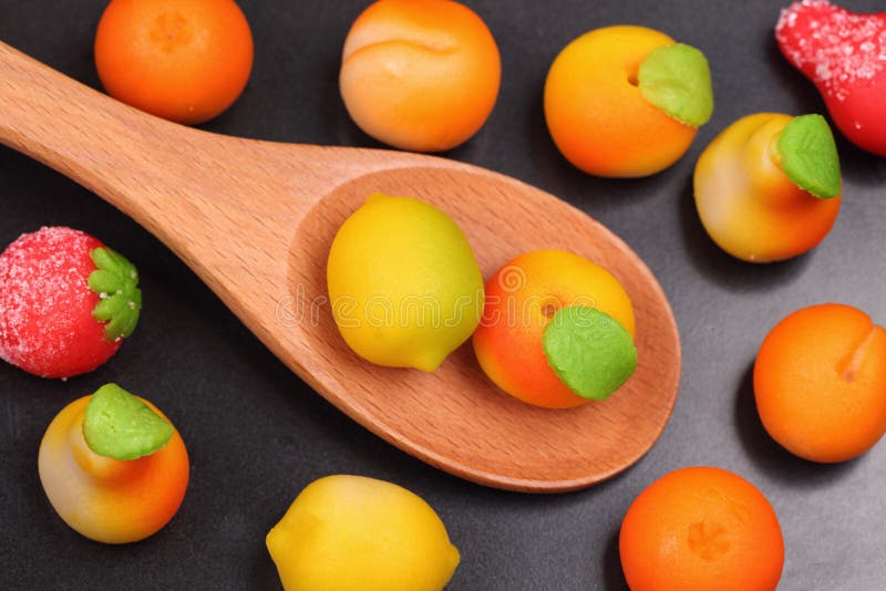 Marzipan Fruit Shapes in a Wooden Spoon Stock Photo - Image of candy ...