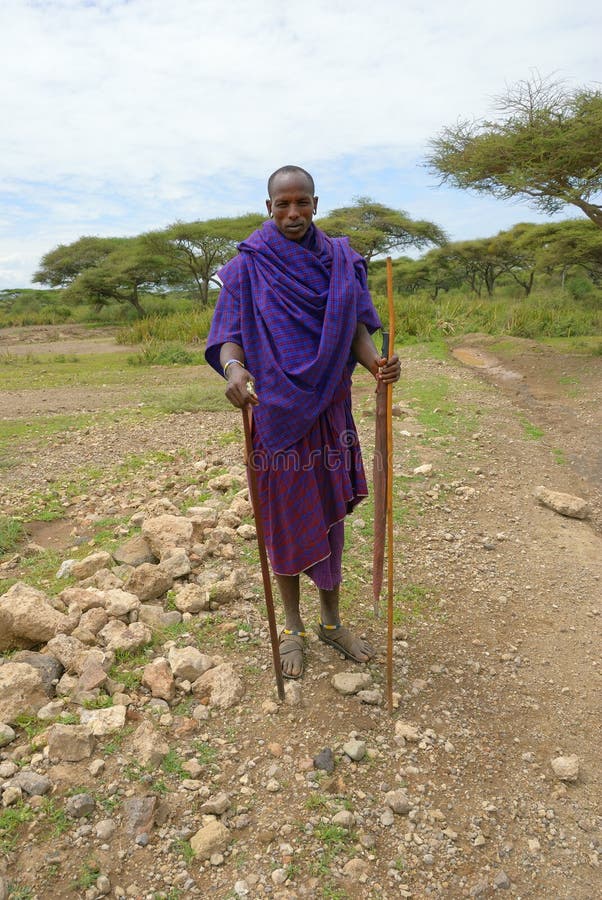 Masai man editorial image. Image of local, colorful, umbrela - 25293825