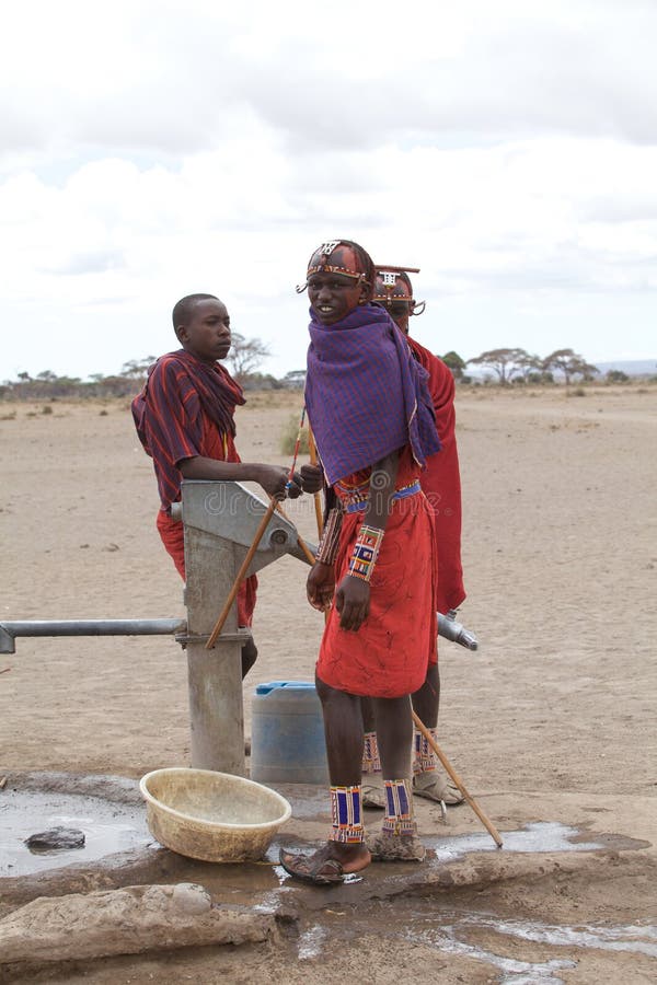 Masai men editorial photo. Image of pump, tourism, colors - 21721166