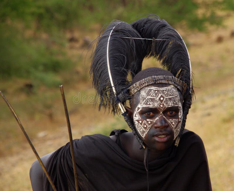 Maasai Man, Warrior, Typical Garb and Male Lion Mane on Head, Spear in ...