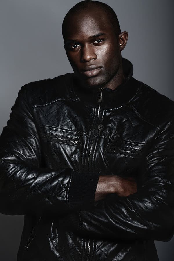 Masculine Confidence. a Handsome African Man Modeling Clothes in Studio ...