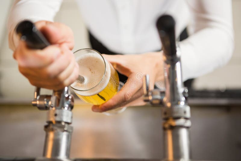 Masculine Hands Pouring a Pint Stock Photo - Image of staff, bartender ...