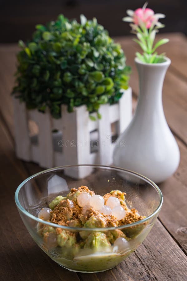 Mashed Avocado with Tapioca Pearls and Sweet Crashed Biscuit Stock ...