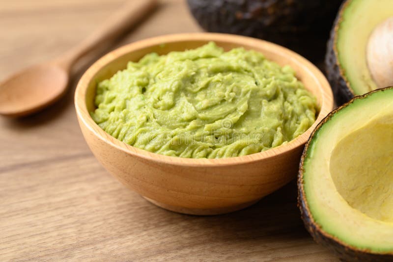 Mashed Avocado in Wooden Bowl and Hass Avocado Fruit, Healthy Eating ...