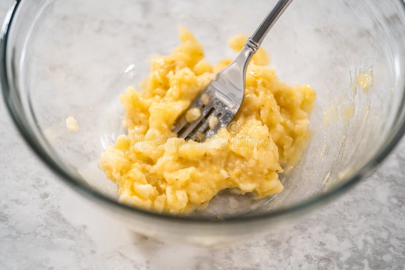 Mashed bananas stock photo. Image of preparing, fork - 294522674
