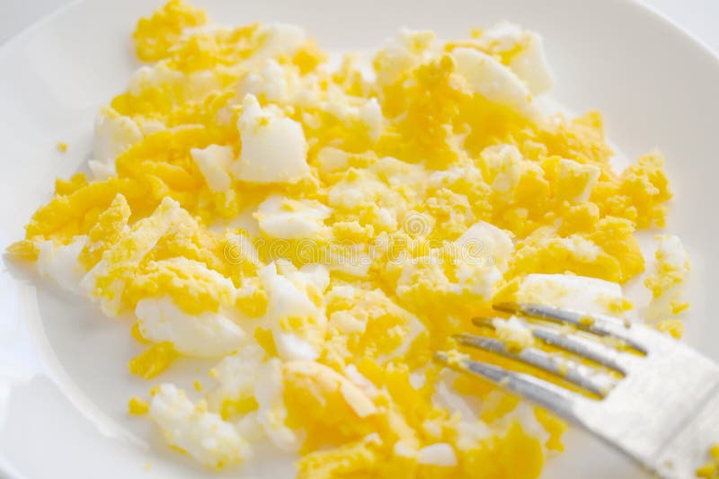Mashed Egg with a Fork on a White Plate. Stock Image - Image of healthy ...