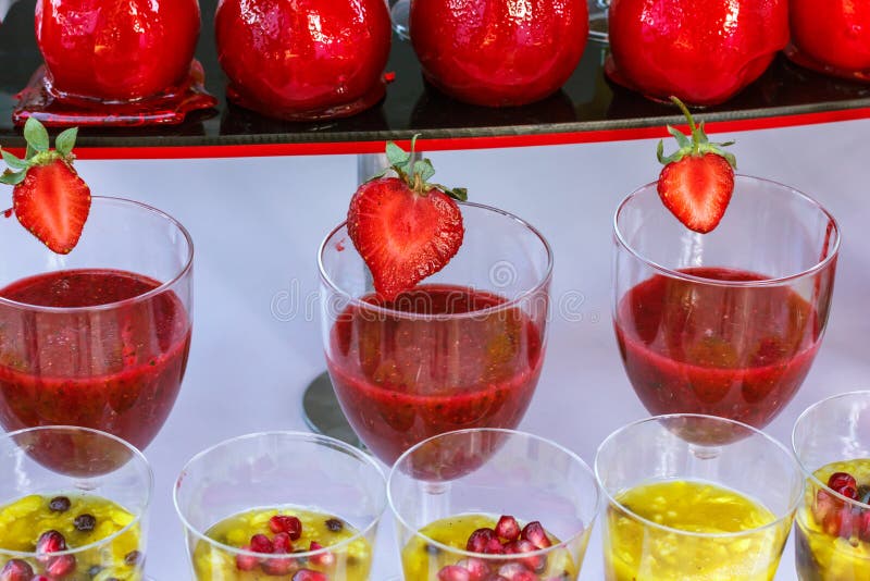 Mashed Fresh Fruits - Strawberries, Oranges and Kiwi in Cups Stock ...