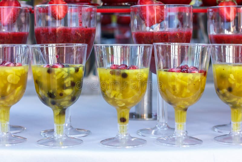 Mashed Fresh Fruits - Strawberries, Oranges and Kiwi in Cups Stock ...