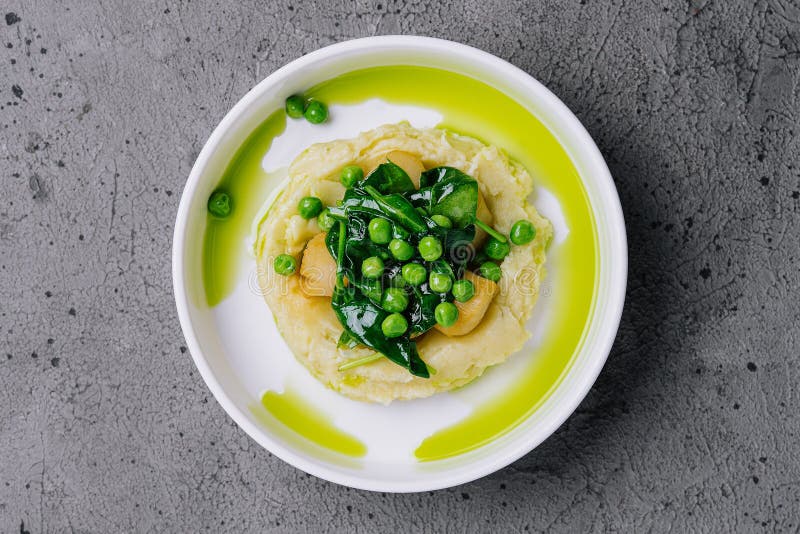 Mashed Potato with Butter, Green Peas, Basil in a White Bowl Stock ...