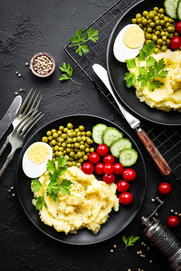Mashed Potato with Green Peas, Tomatoes and Boiled Egg. Potato Puree on ...