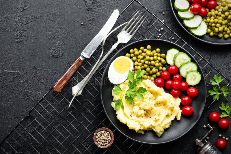 Mashed Potato with Green Peas, Tomatoes and Boiled Egg. Potato Puree on ...