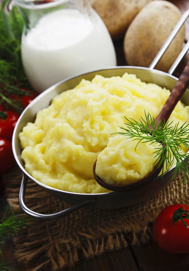 Mashed potato with milk stock image. Image of cooked - 184233631
