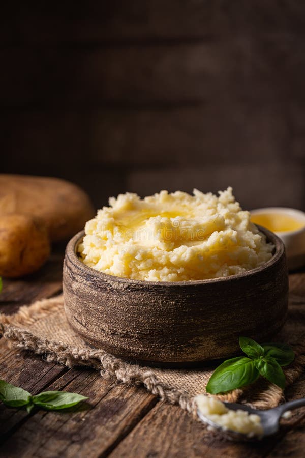 Mashed potatoes in bowl stock photo. Image of yellow - 255008238