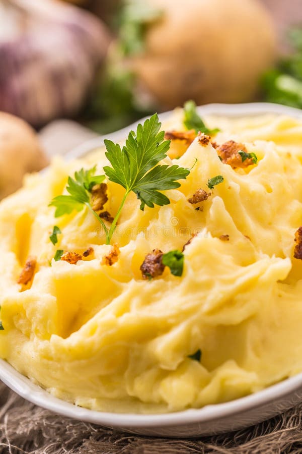 Mashed Potatoes in Bowl Decorated with Parsley Herbs. Stock Image ...