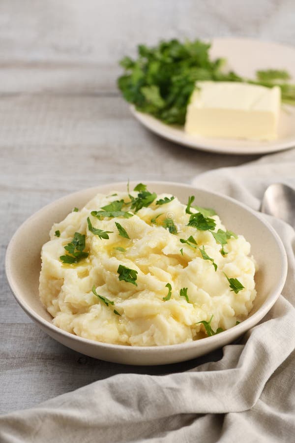Mashed Potatoes with Butter Stock Photo - Image of herbs, dish: 266310916