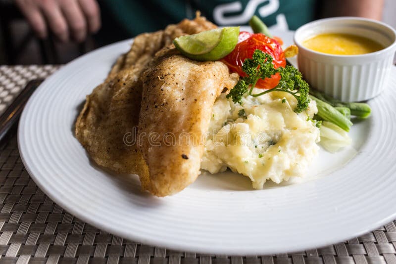 Mashed Potatoes and Fried Fish with Vegetables and Sauce Stock Photo ...