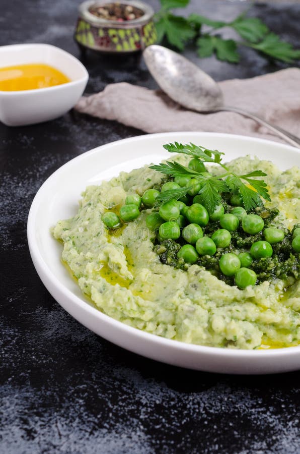 Mashed Potatoes with Green Peas Stock Image - Image of cooked, pesto ...