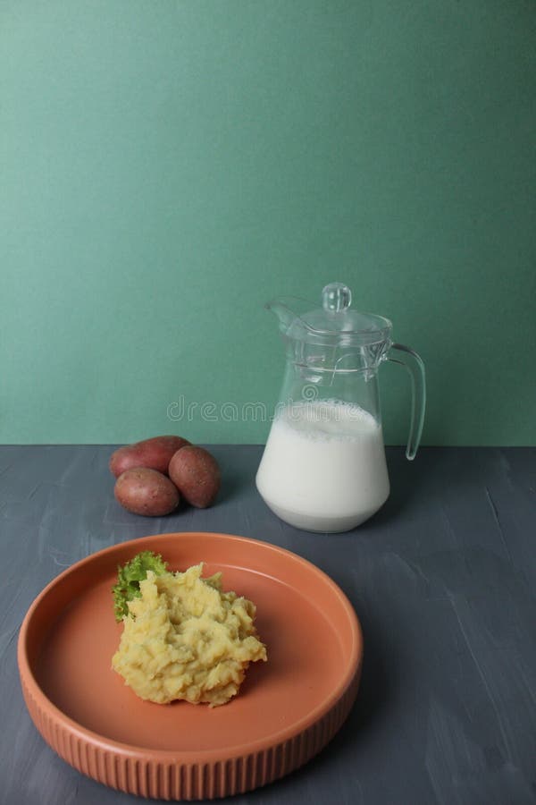 Mashed Potatoes on a Plate Jug of Milk on Grey Background Vegetarian ...