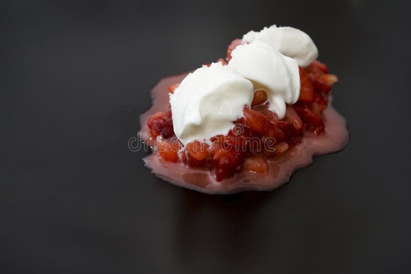Mashed Strawberries with Sour Cream and Sugar, Isolated on Black Stock ...