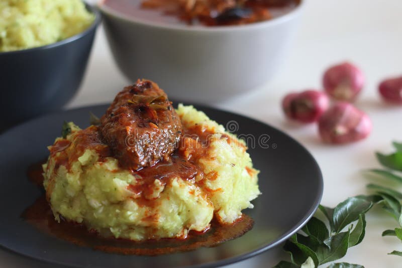 Mashed Tapioca Served with Pomfret Fish Curry. Boiled and Strained ...