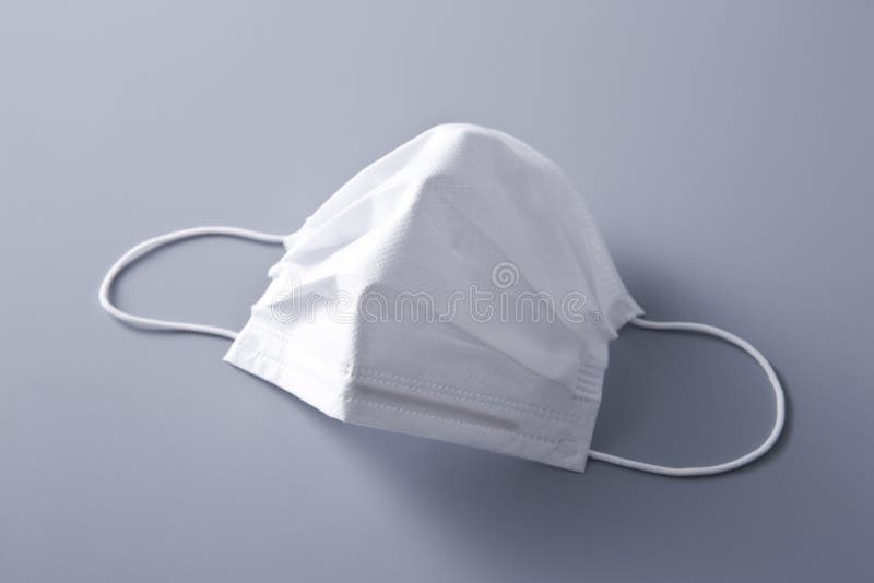 White Medical Mask. Surgical Used Mask with Rubber Ear Straps. Typical ...